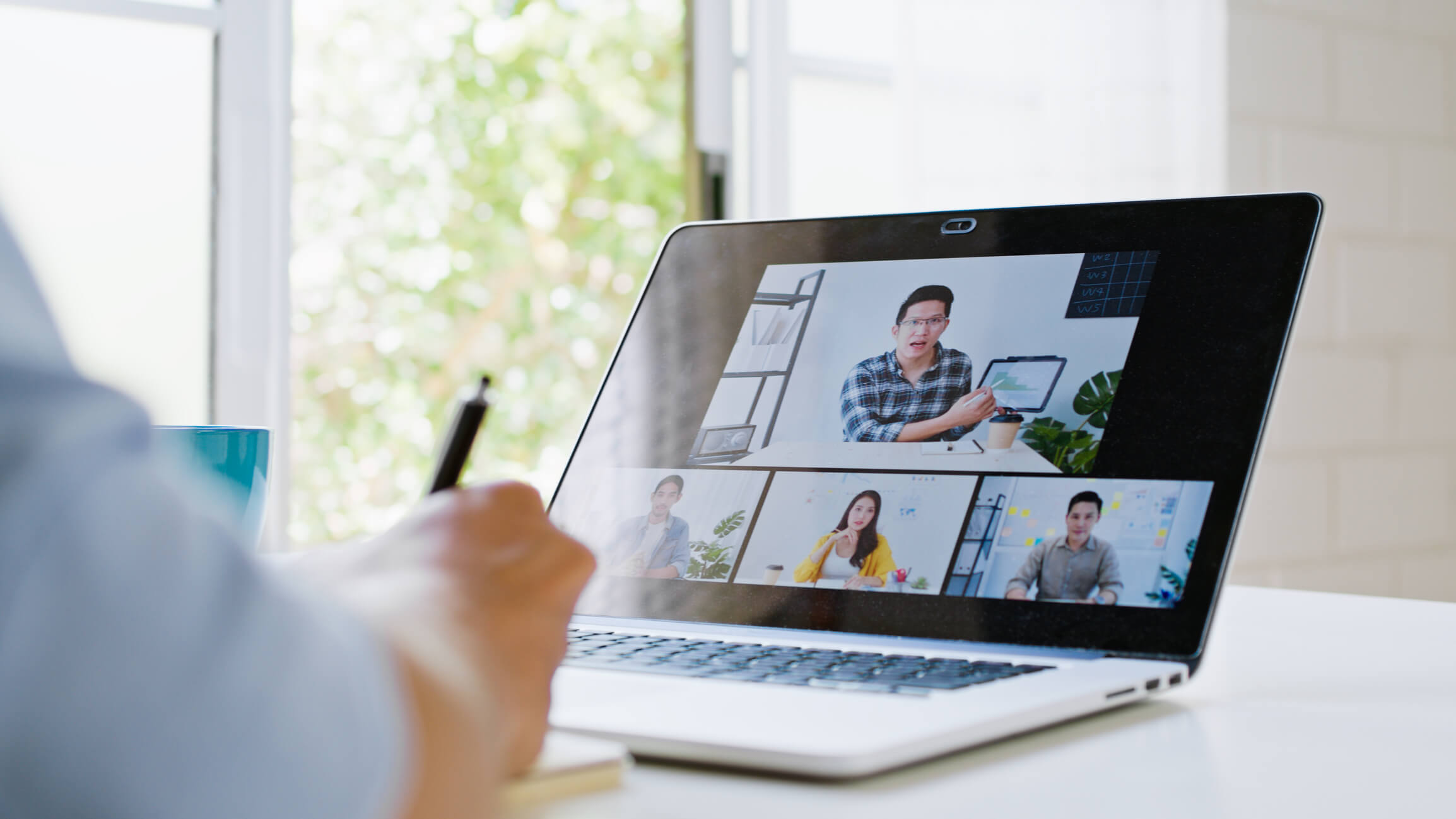 What Tools Are Essential For Effective Remote Team Management?